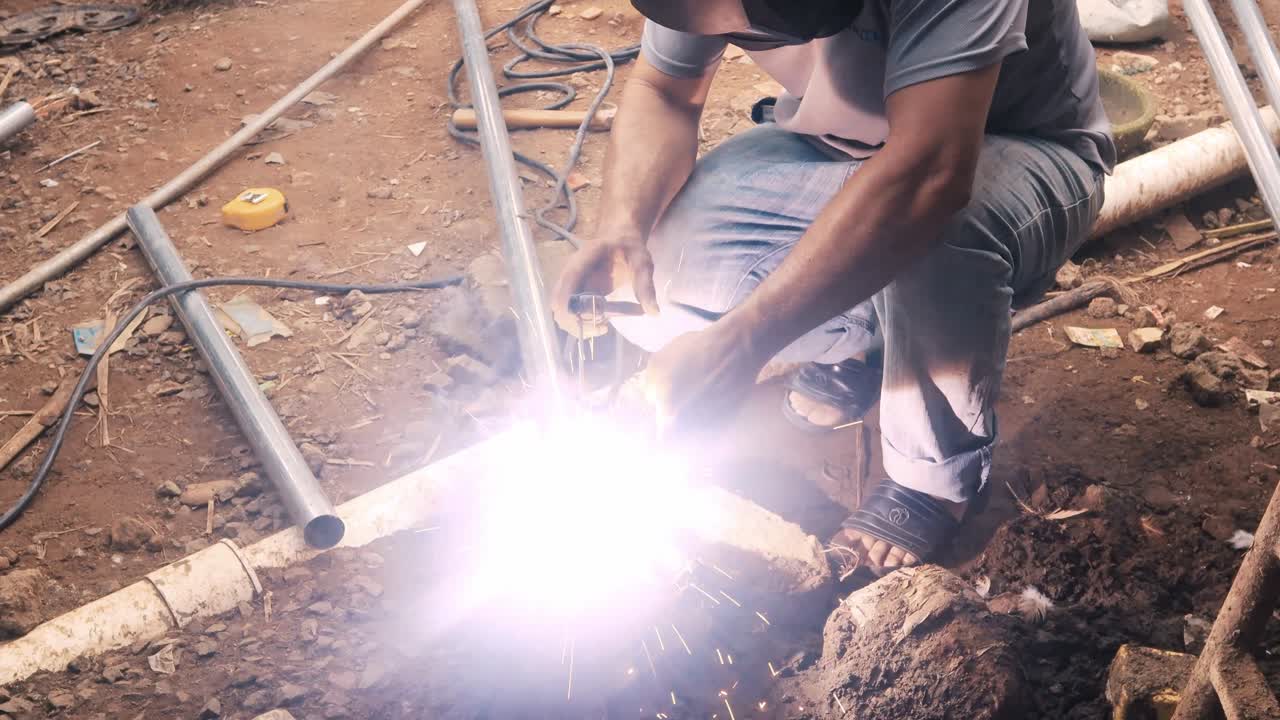 Premium stock video - Professional welder employing industrial welding ...