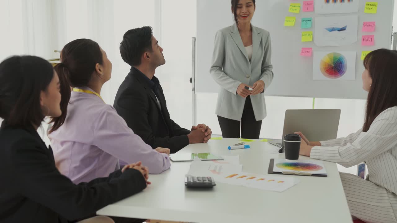 Businesswoman proficiently present work project receive celebrations ...