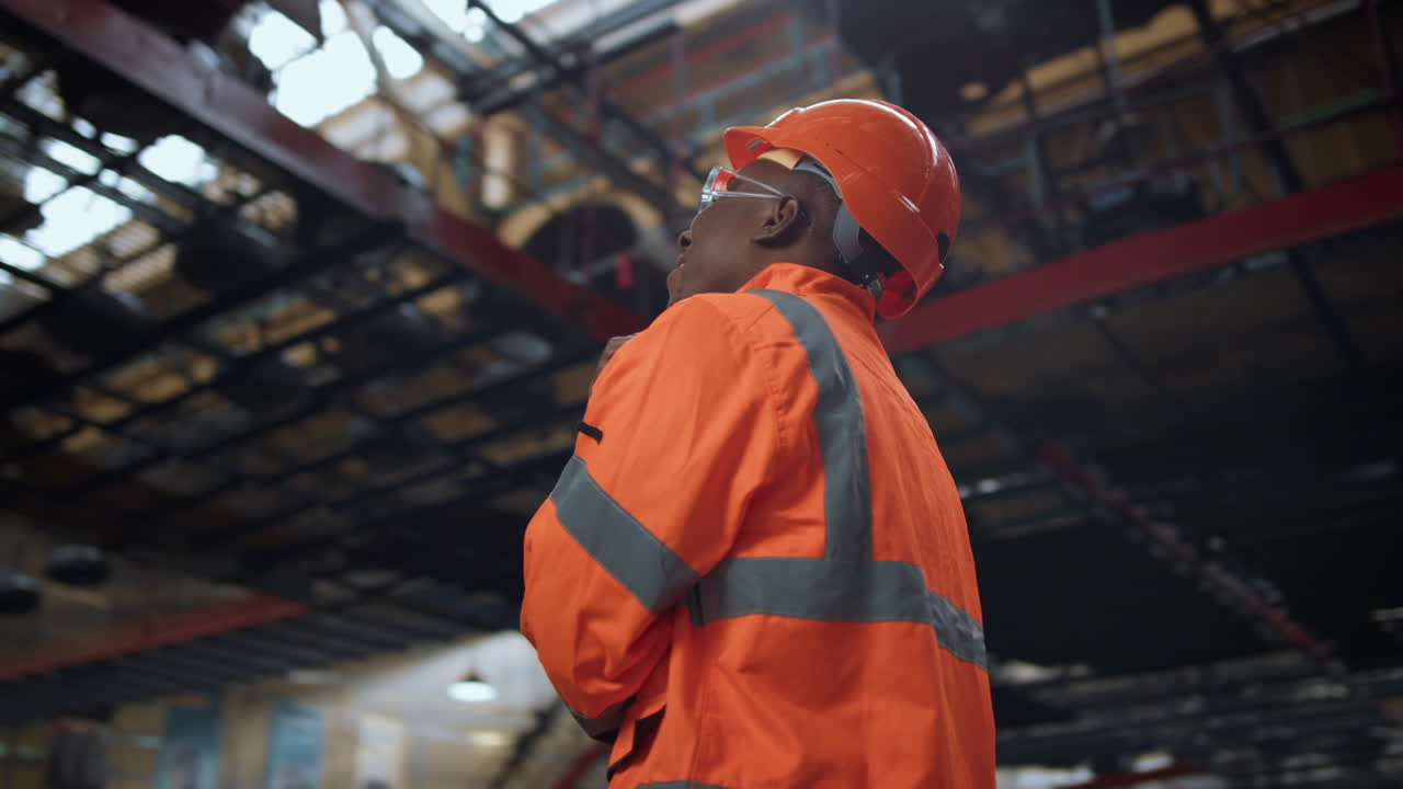 Premium stock video - Black hair supervisor thinking project work at ...