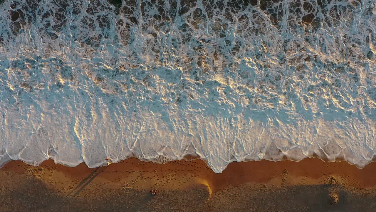 Premium stock video - Stunning drone view over a tropical beach with ...