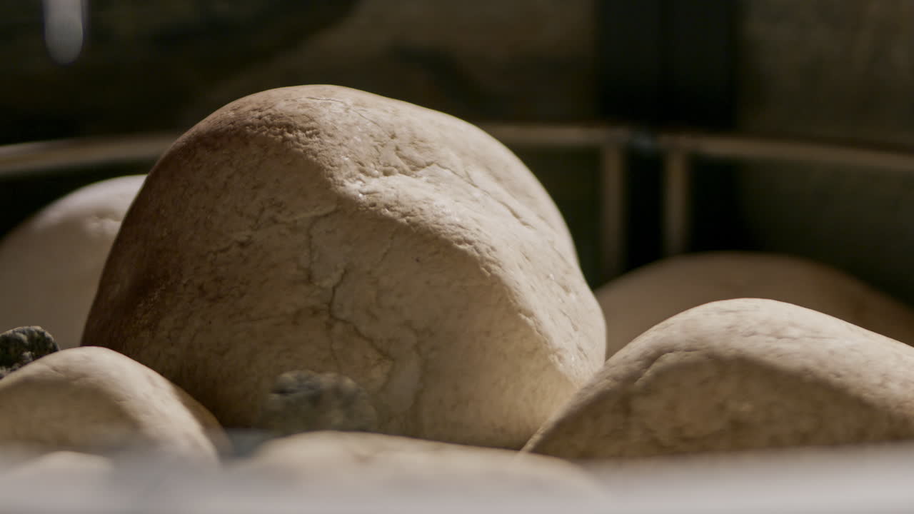 Throwing Water On The Sauna Stones In The Sauna Stove, Creating Steam ...