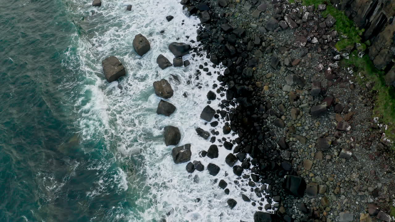 Waves Splashing On Jagged Basalt Rocks Along Shoreline Of Isle Of Skye ...