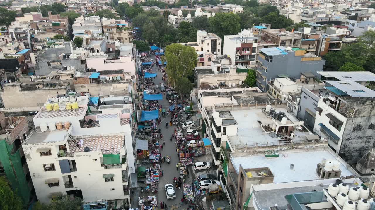 Premium stock video - 4k aerial shots of sunday market in new delhi ...