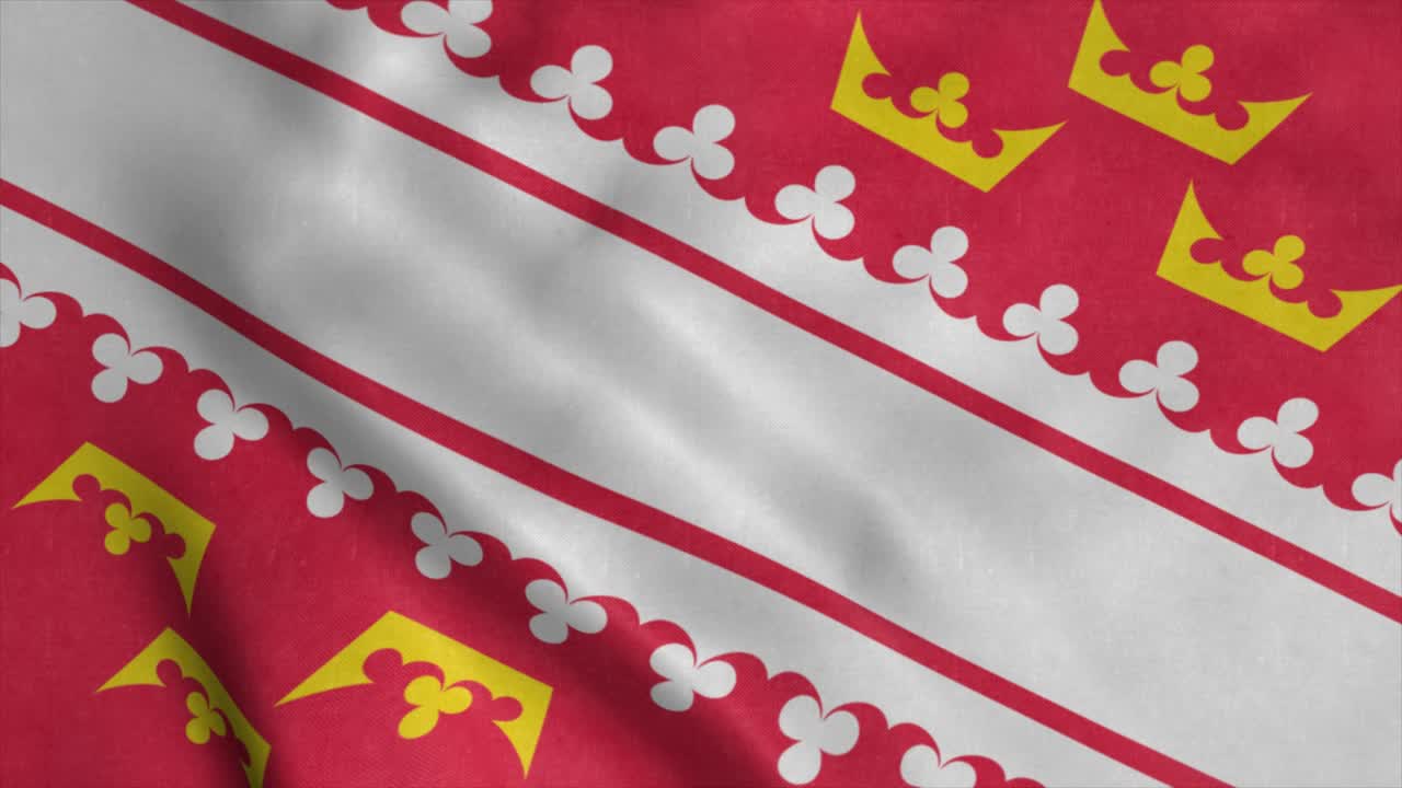 alsace flag france waving in the wind blue sky background | freepik