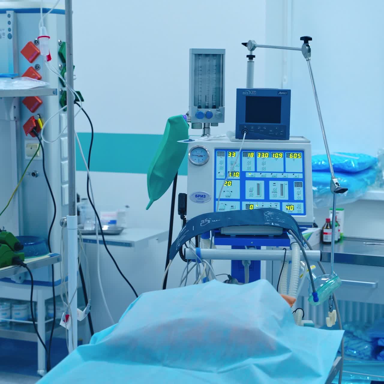 Anesthetic machine inside the modern operating room. Medical ventilator ...