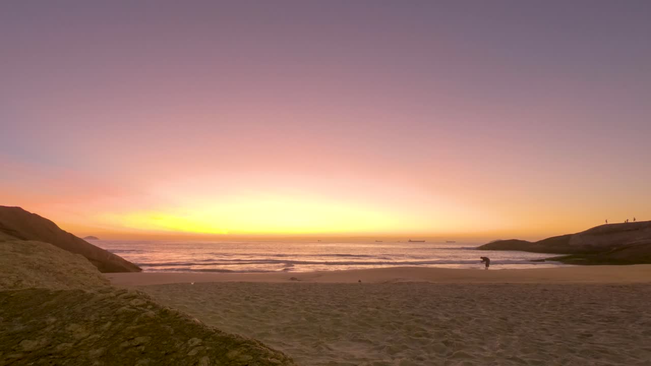 Time lapse of sunrise from before the sun appears to just after at the ...