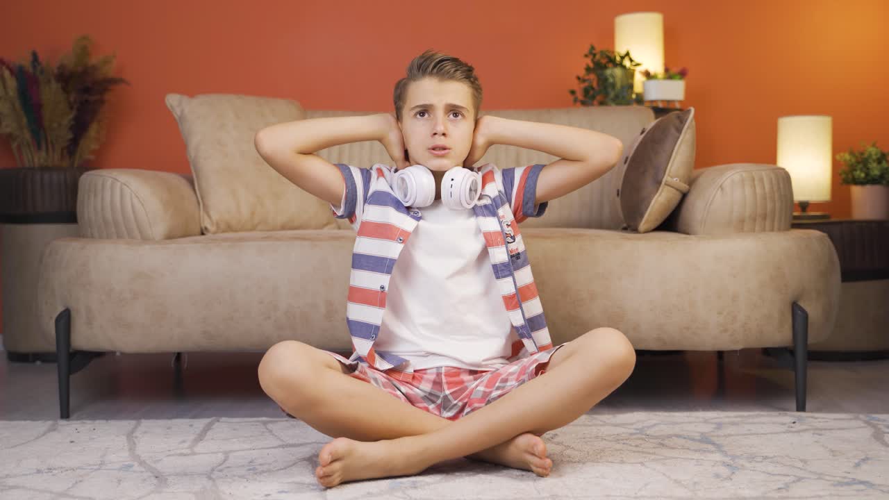 Premium stock video - A boy under family pressure.