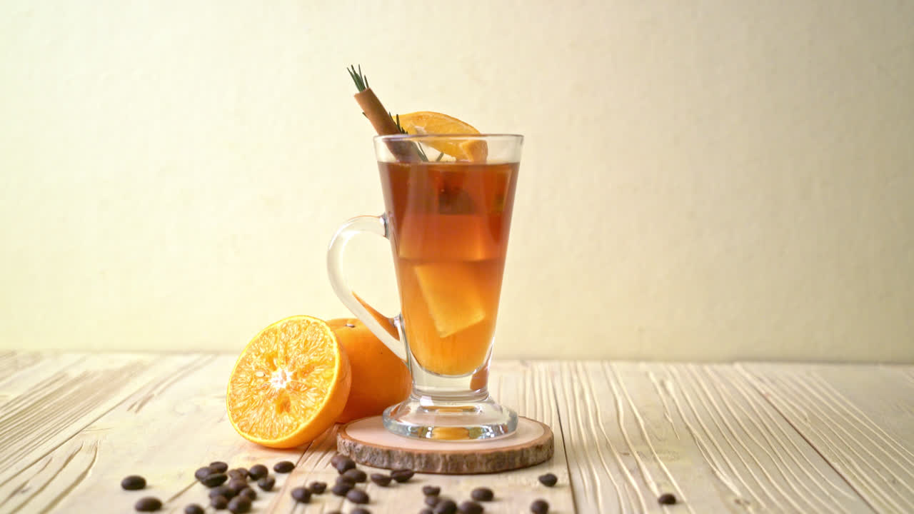 Premium stock video - A glass of iced americano black coffee and layer ...