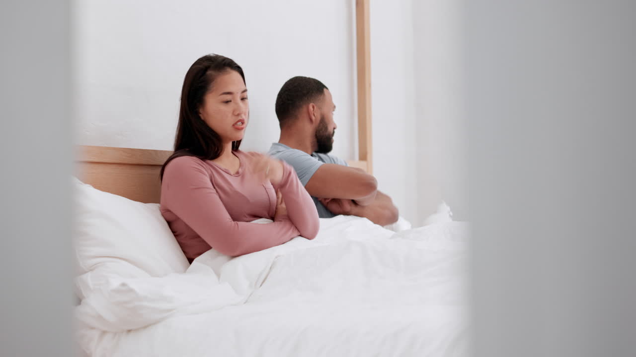 Premium stock video - Couple in bed, conflict and anger with stress