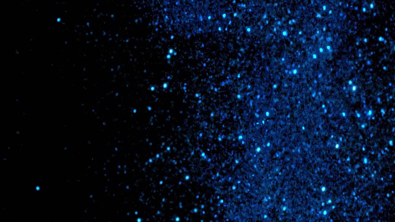 Blue glitter falling. abstract background Premium Stock Video Footage