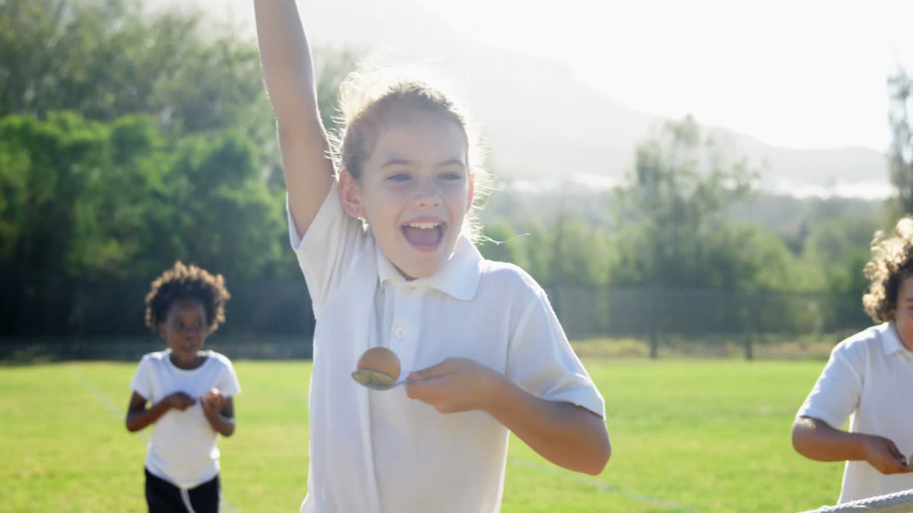 Premium stock video - Children playing lemon and spoon race