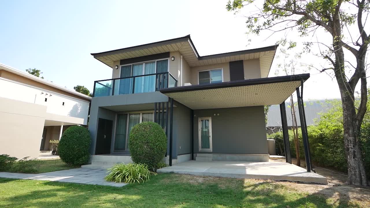 Premium stock video - Spacious and modern house with large windows and ...