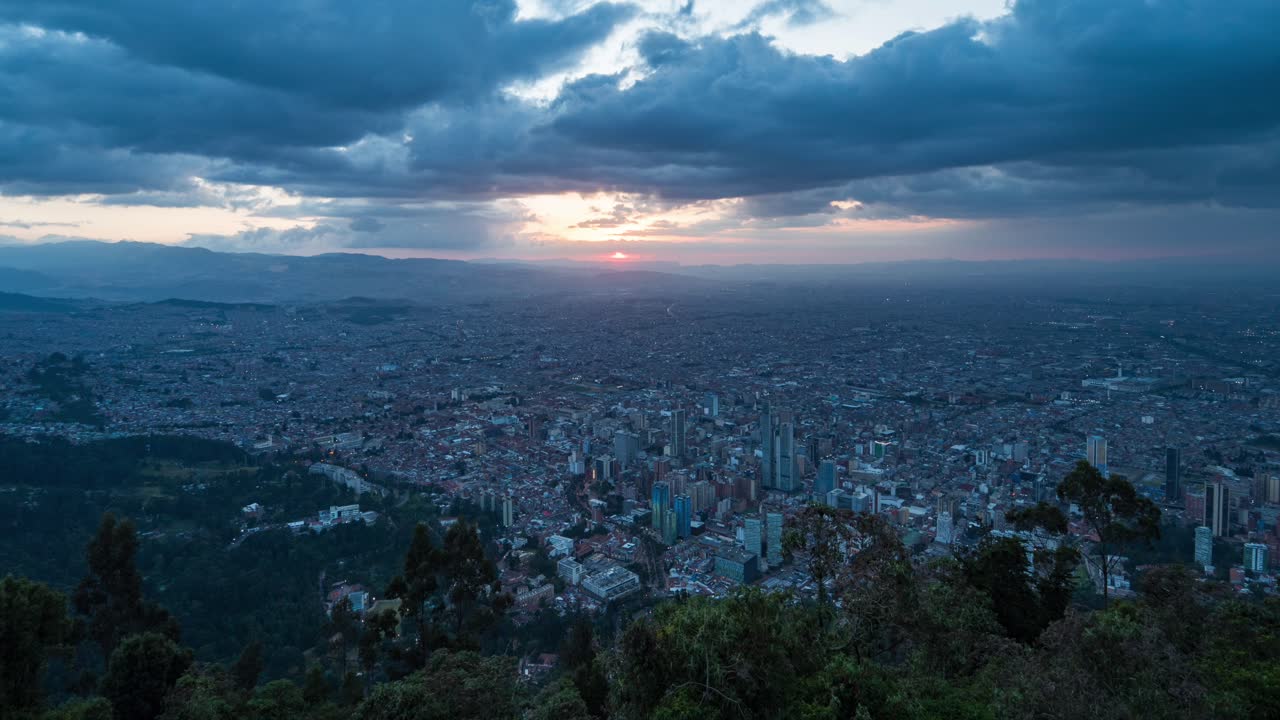 Day to night timelapse overlooking the city of Bogota, Colombia from ...