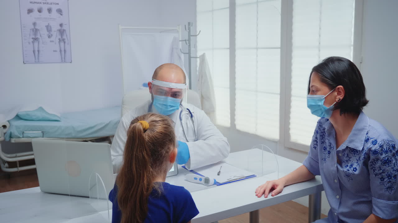 Premium stock video - Doctor showing skeleton on tablet