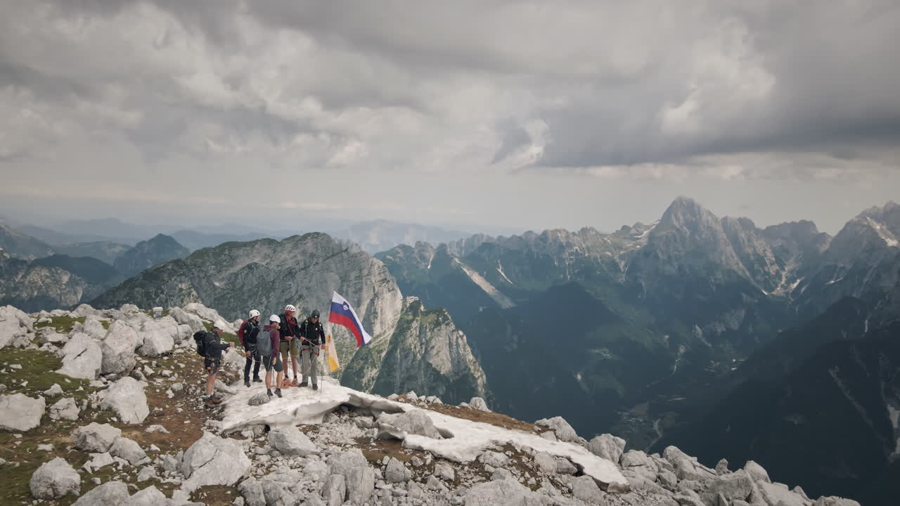 Premium stock video - Drone shot from top of mountain rombon, a group ...