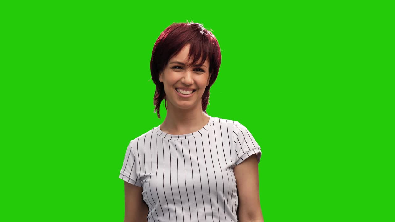 Beautiful Female Model Posing On Green Screen Blows Kiss And Shows ...