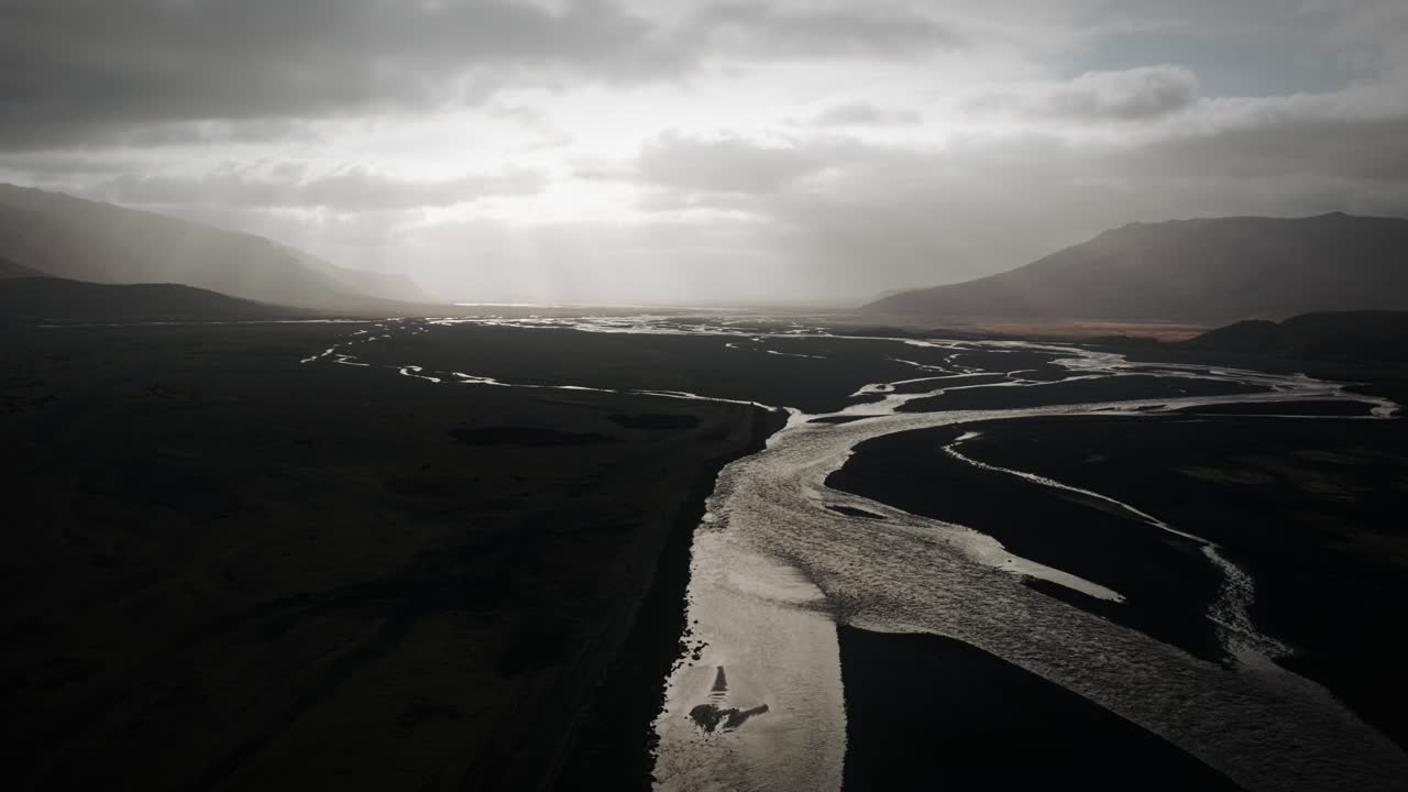 Cinematic Aerial Thor Valley, Glacial Rivers Flowing Through Black ...