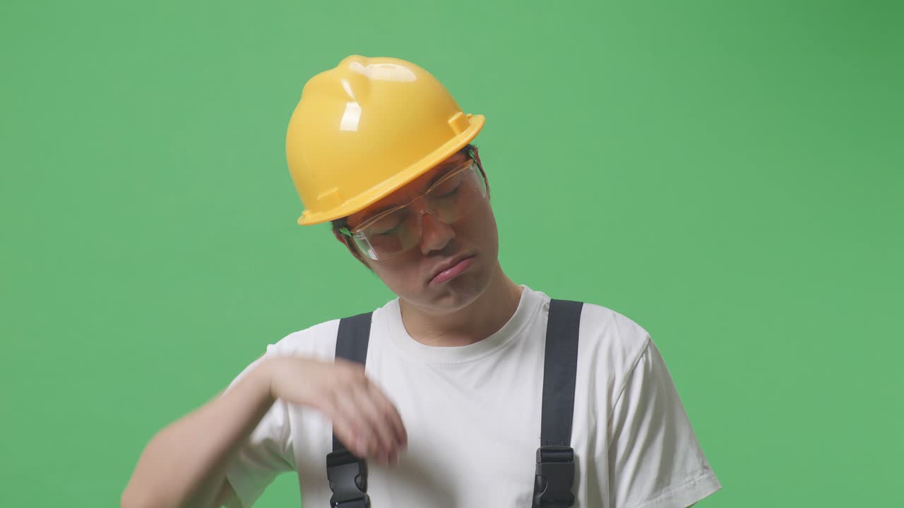Close Up Of Asian Man Worker Wearing Goggles And Safety Helmet Wiping ...
