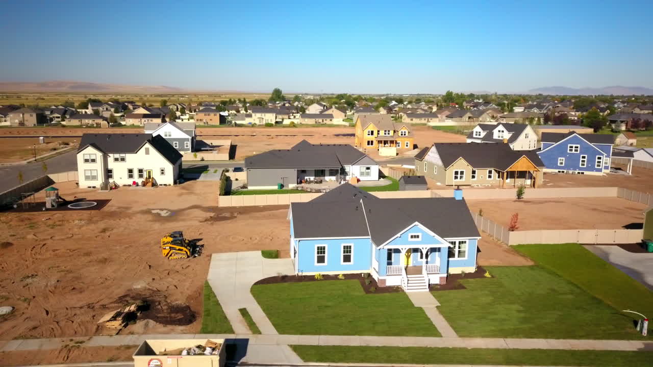 Premium stock video - A drone shot of finishing touches on a brand new ...