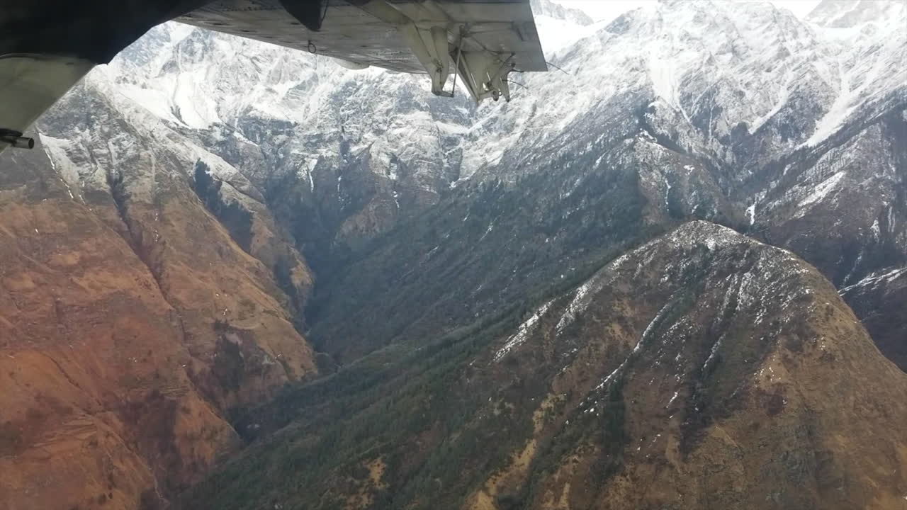 Flying Through The Himalaya Mountain Range In An Airplane Free Stock ...