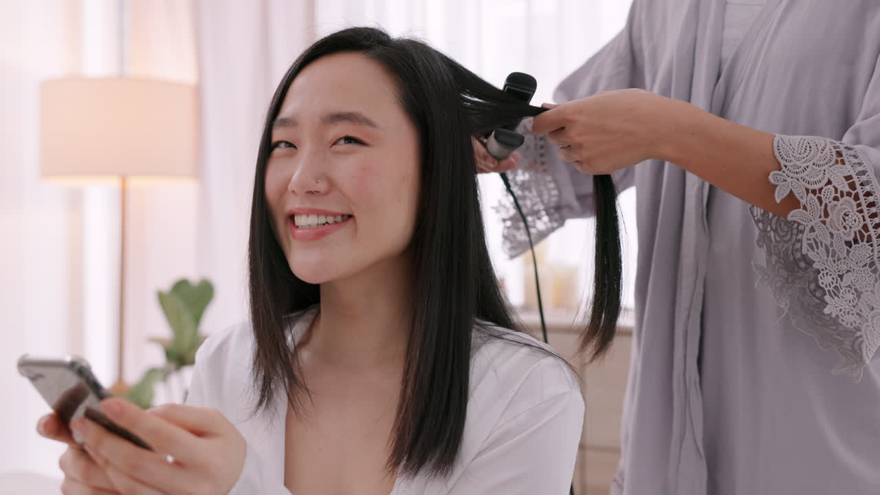 Premium stock video - Salon, phone and hair with a woman