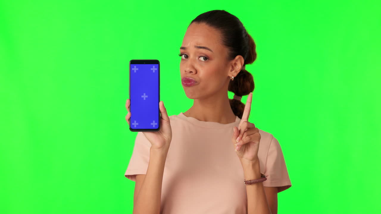 Premium stock video - Green screen phone, woman face