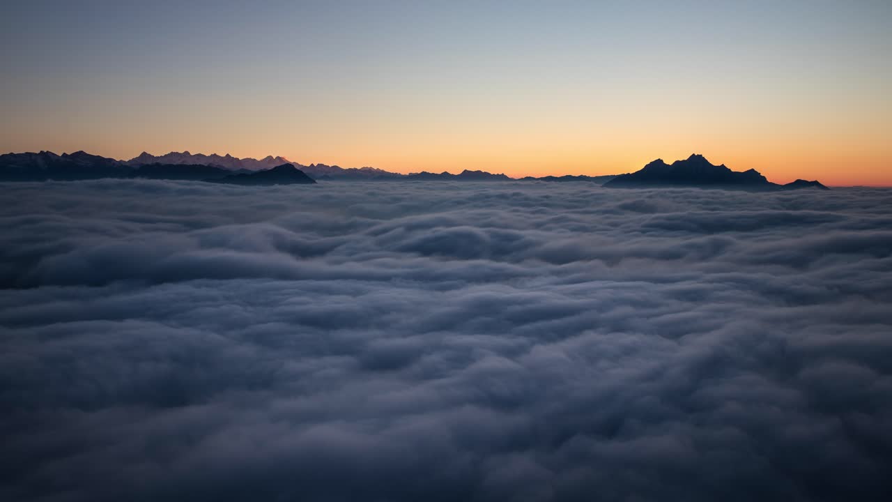 Premium stock video - Day to night sunset time lapse above a cloud ...
