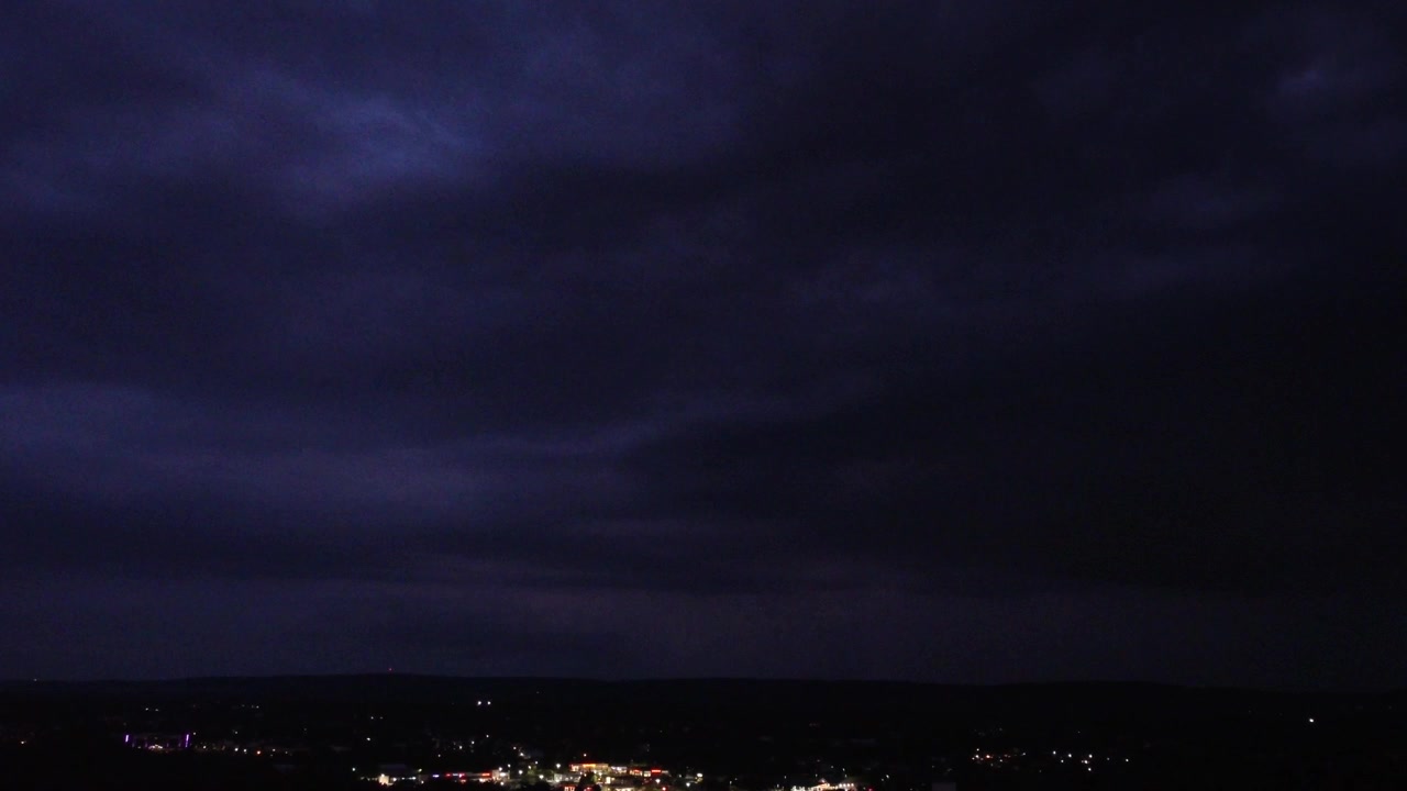 Thunder and lightning in a storm cloud-filled night sky | Premium Stock ...