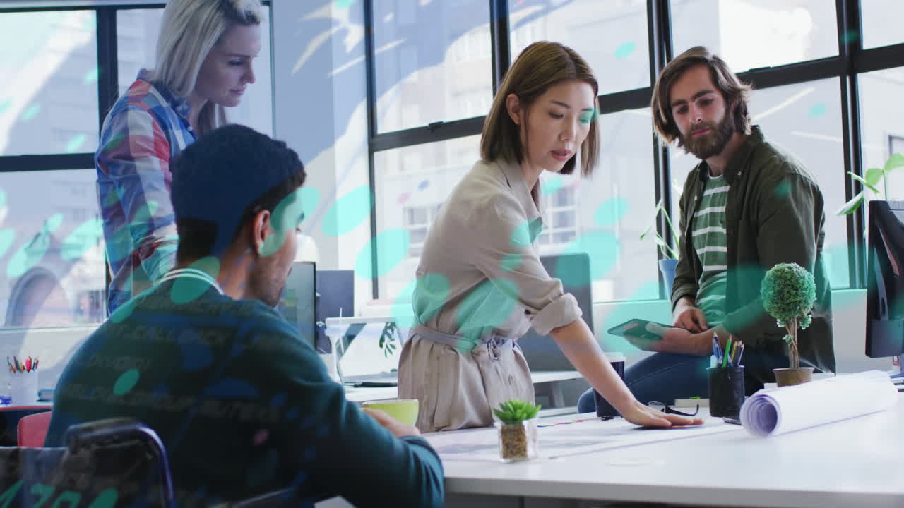 Animation Of Graphs And Map Over Diverse Woman Sharing Ideas With Coworkers About Blueprint Free ...