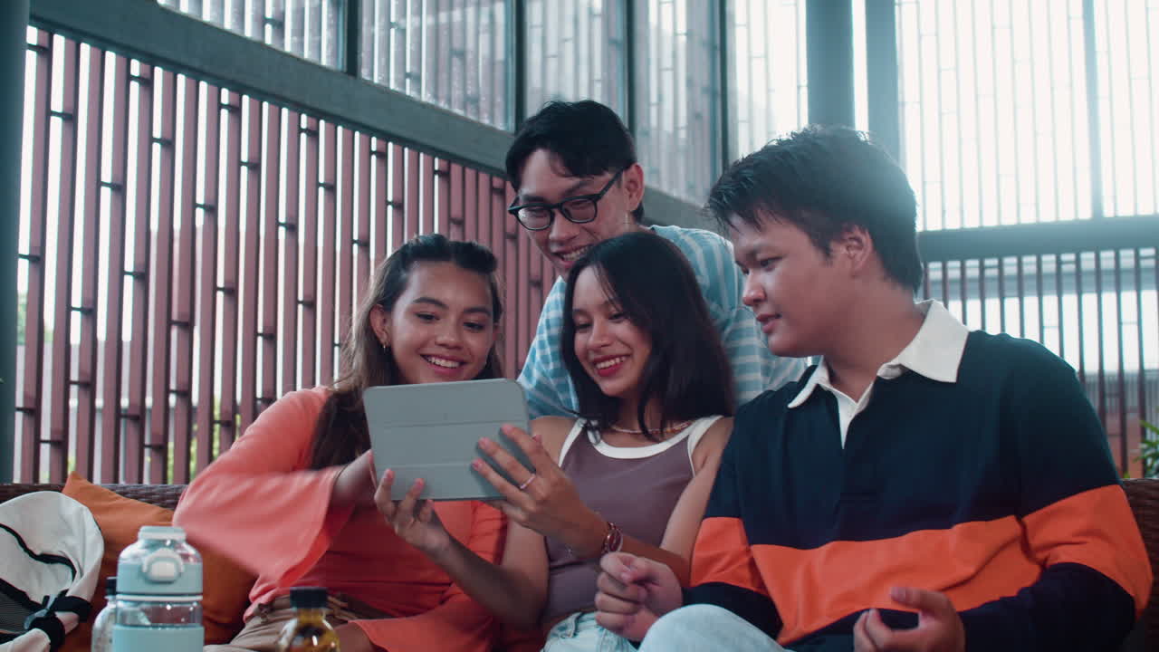 Friends watching funny video | Free Stock Video Footage