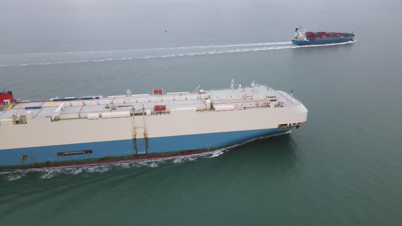 4K 30FPS Aerial Drone Flight Following Two Container Ships In The Isle ...