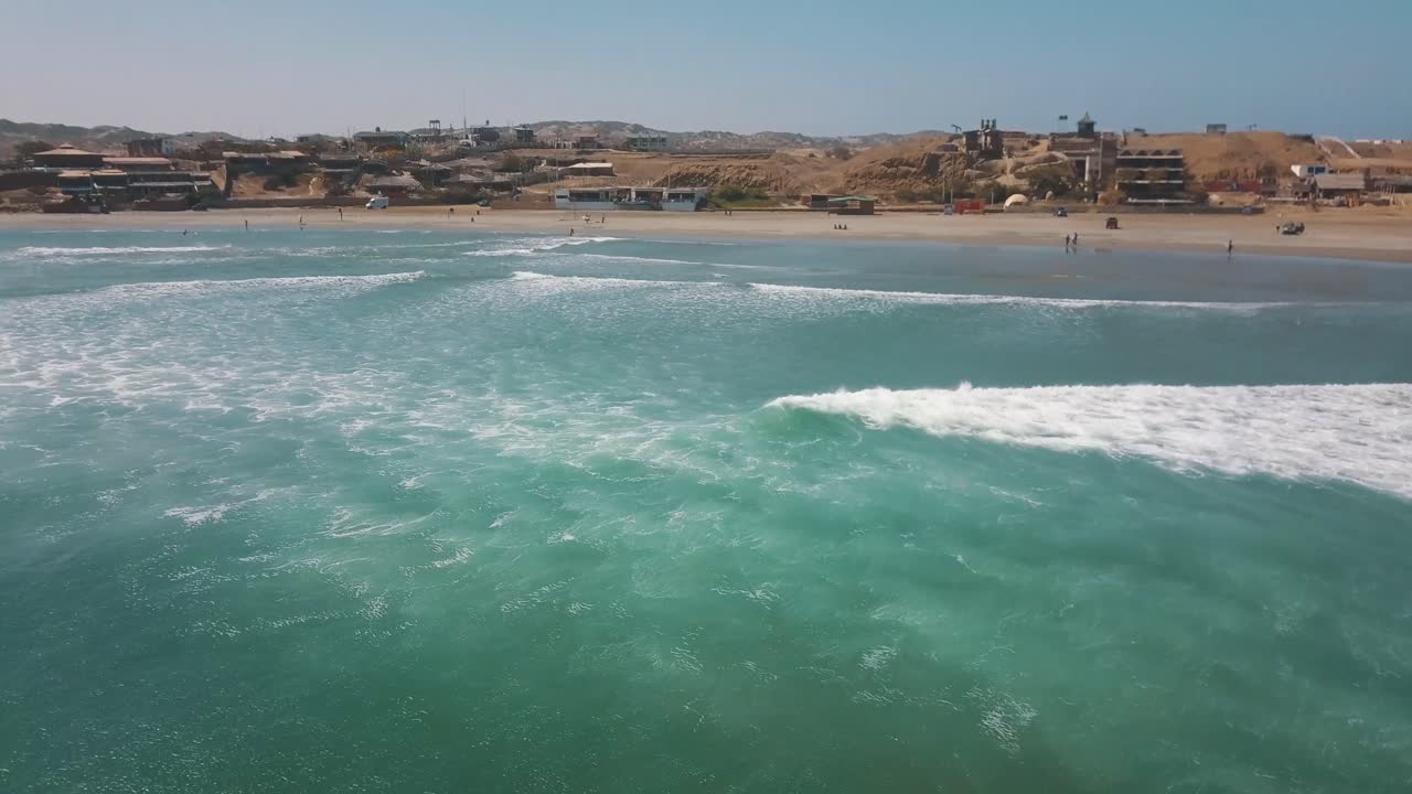 Premium stock video - Waves running ashore in lobitos, peru