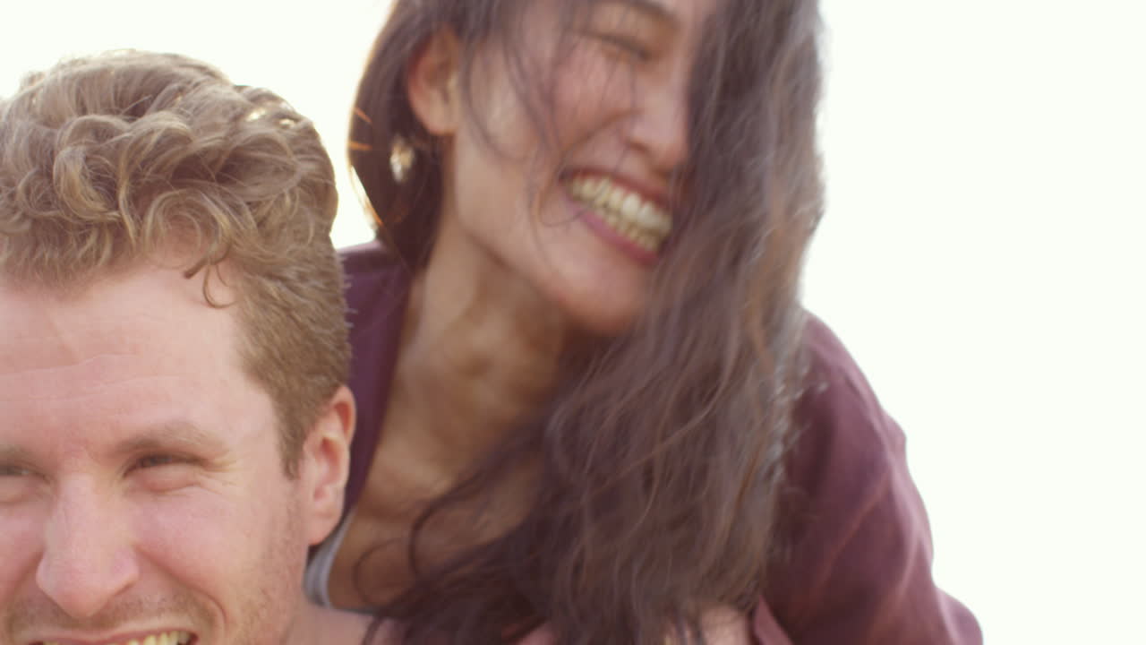 Free stock video - Group of friends smiling and laughing in the sun