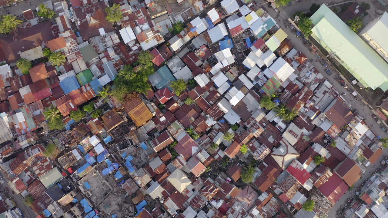 Aerial drone video clustered packed city that is built on water-2 ...