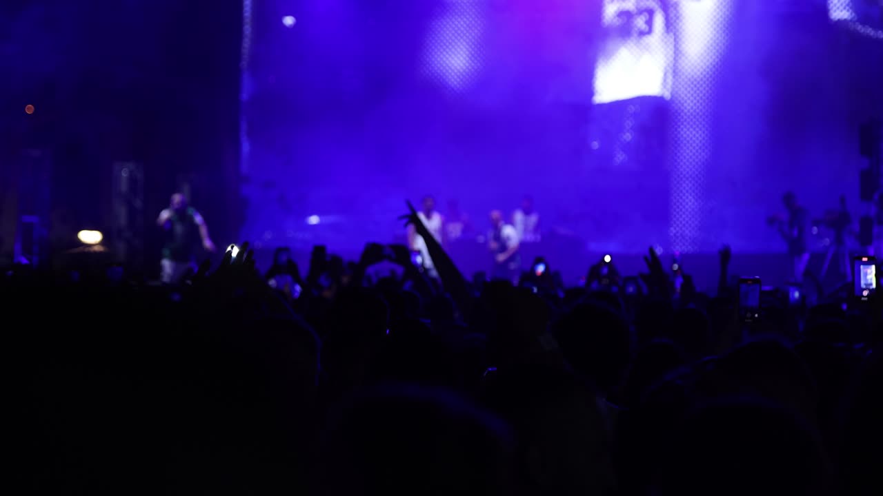 Premium stock video - People slapping hands and listening music on ...