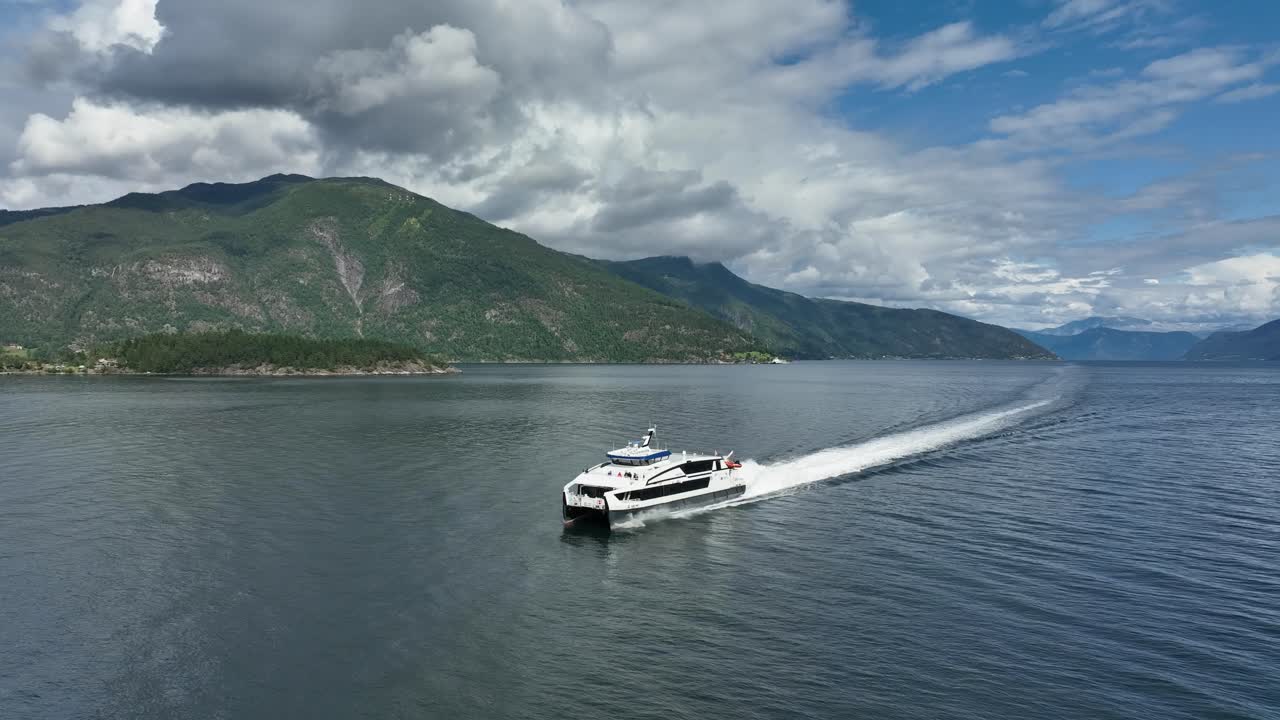 High speed express catamaran boat named vingtor is cruising to ...