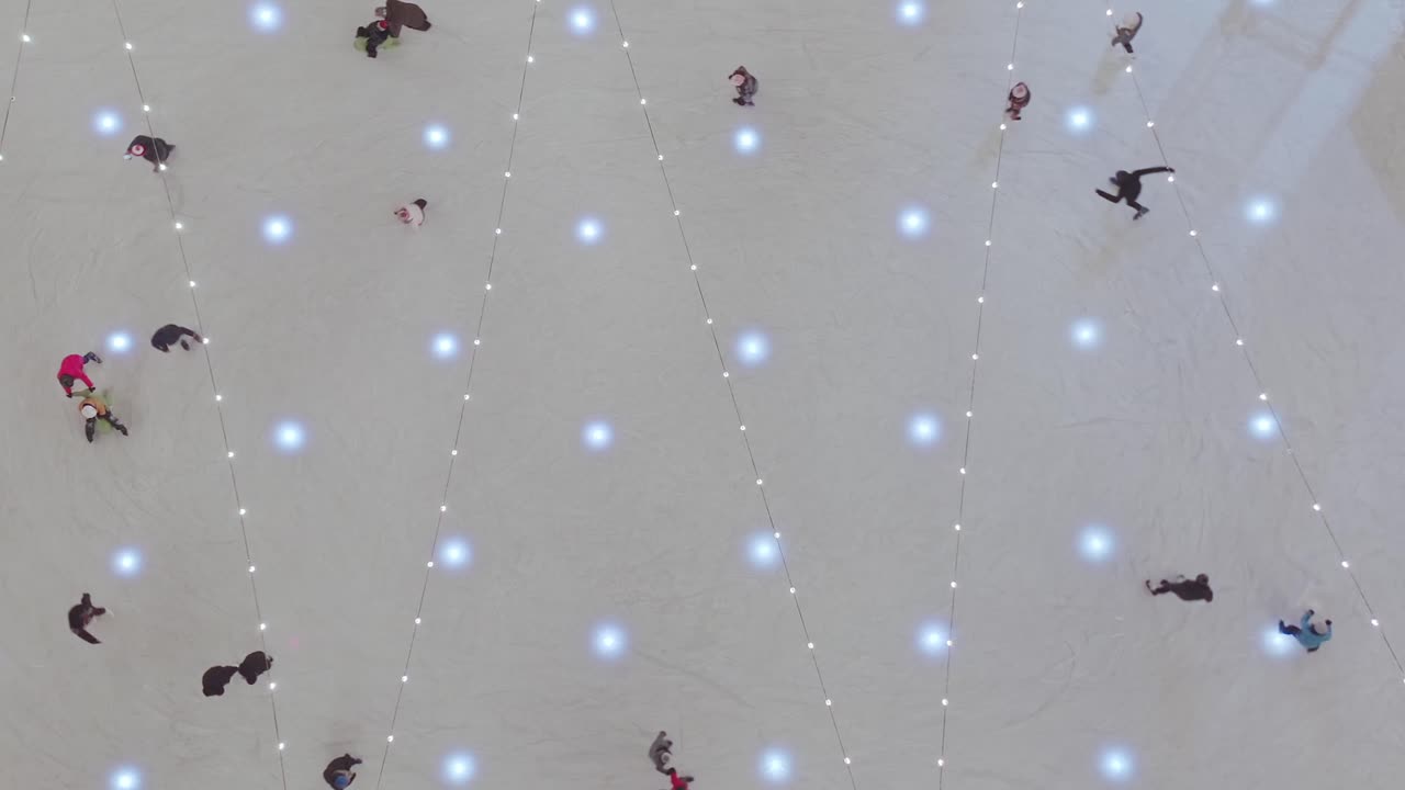 Premium stock video - Aerial top-down view above festive lights and ...