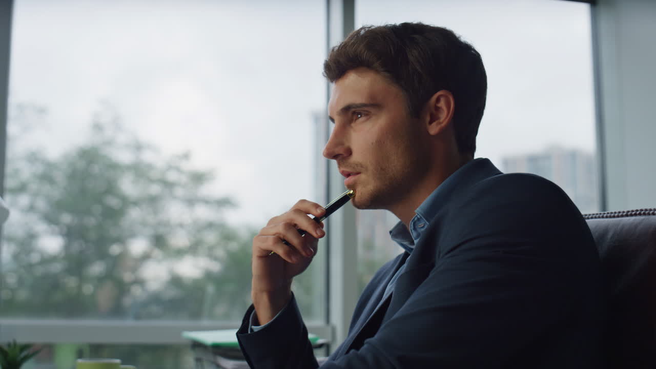 Premium stock video - Thoughtful entrepreneur ponder problems in office ...