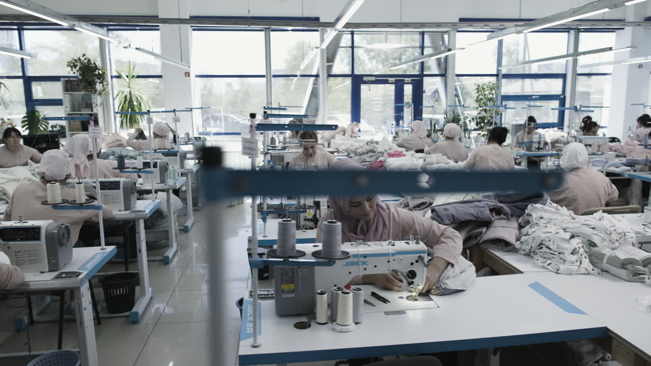 Clothing Factory Workers at Work | Premium Stock Video Footage