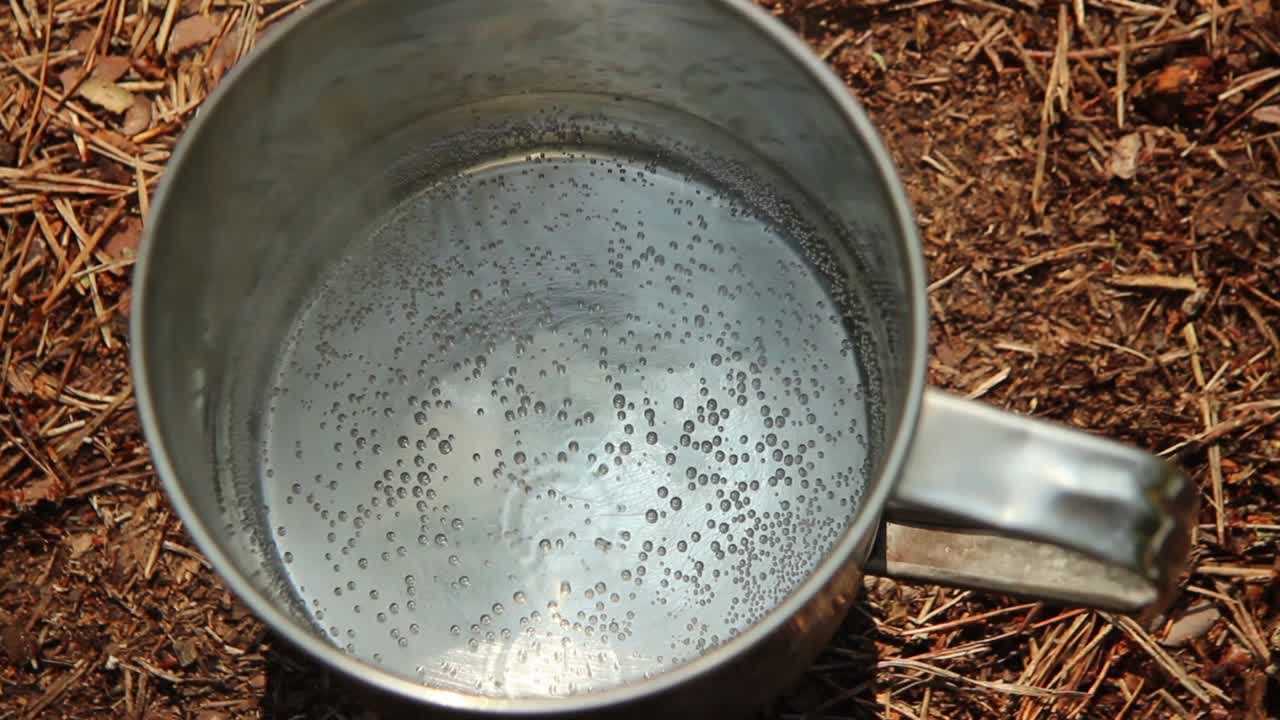Boil Water In A Metal Bowl In The Forest Free Stock Video Footage ...