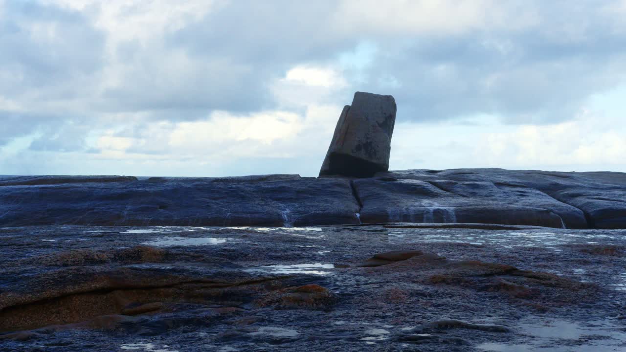 As The Waves Crash Into The Underrock Sea Cave Water Surges From The ...