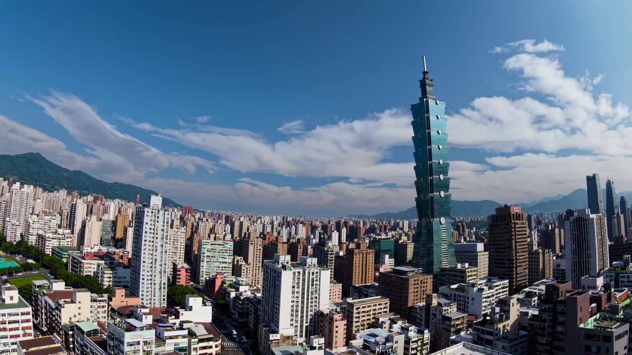 Aerial view of a bustling cityscape with a prominent skyscraper under a ...