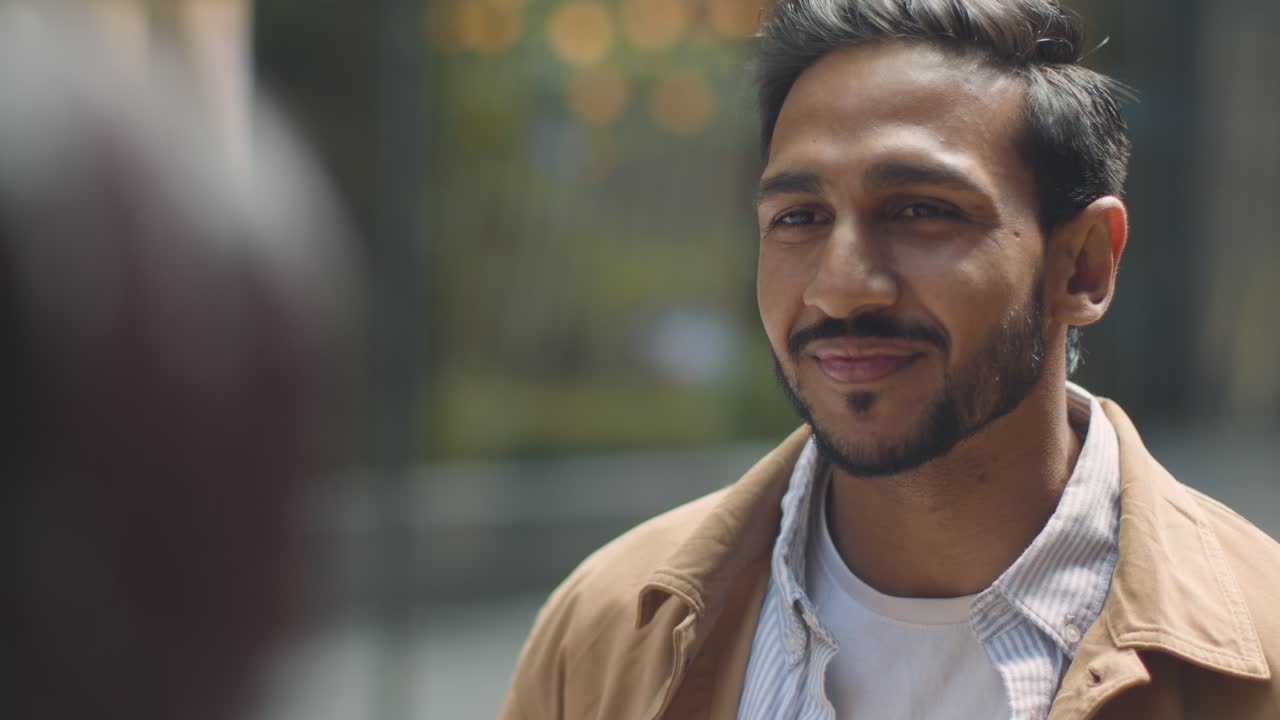 Close Up Of Muslim Couple On Date Meeting And Talking On City Street ...
