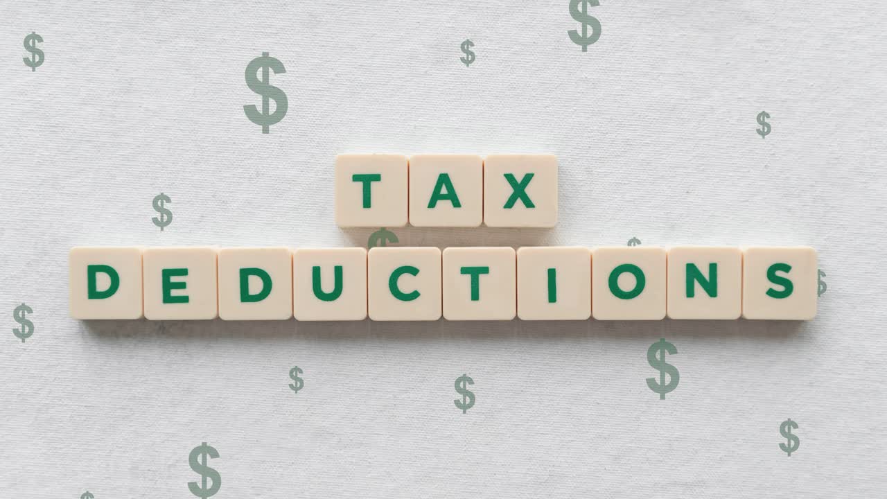 Premium stock video - Scrabble tile illustrating saving money by tax ...