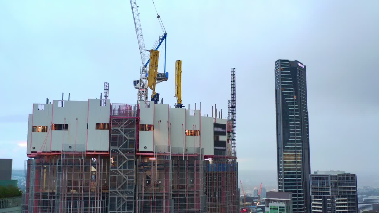 Aerial side view of 443 queen street building construction site with ...