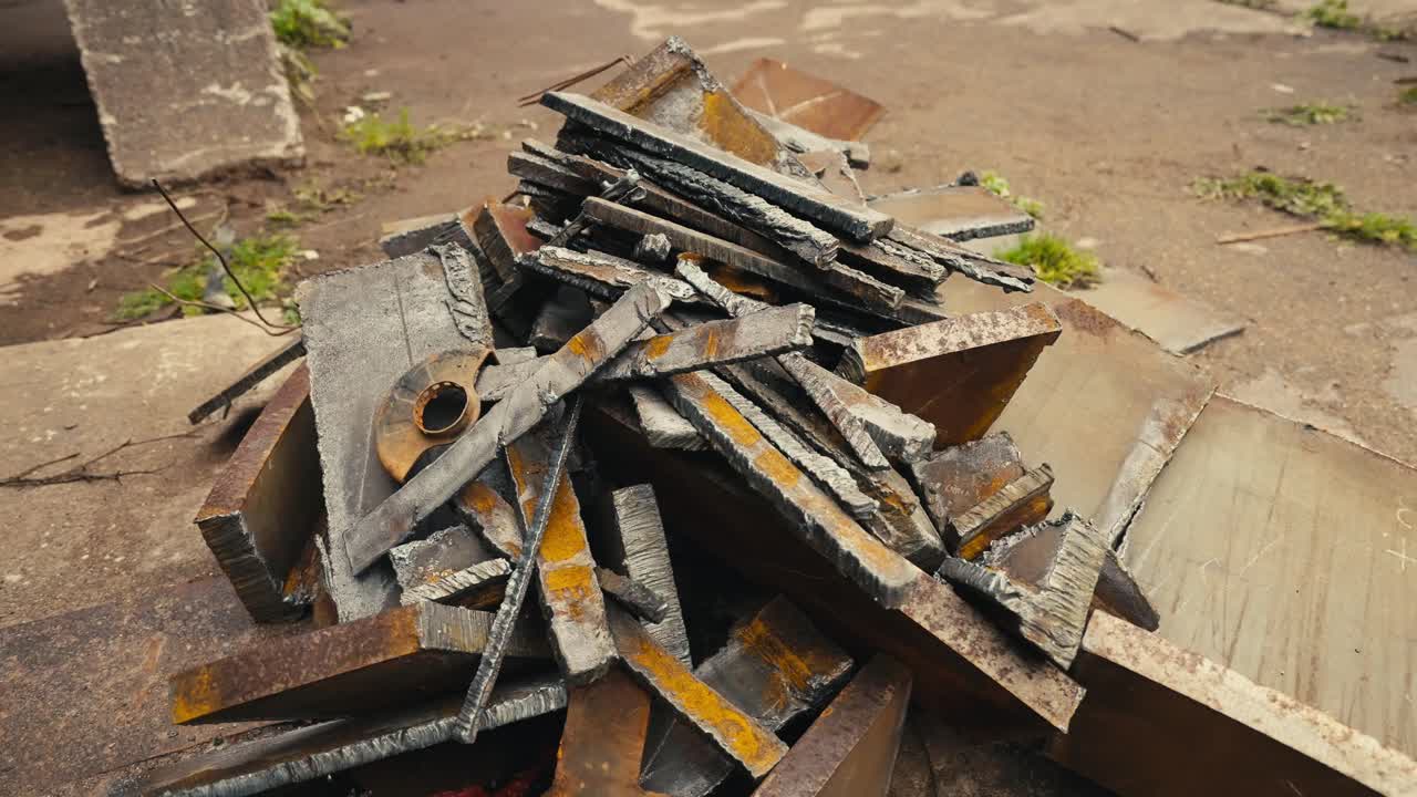 Closeup shot of a pile of rusted scrap metal | Premium Stock Video Footage