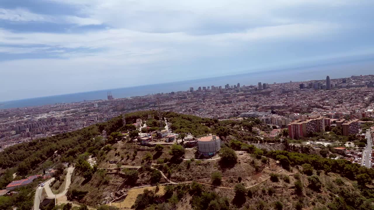 An Aerial Drone Shot A Full View Of The Barcelona Skyline And A Massive ...