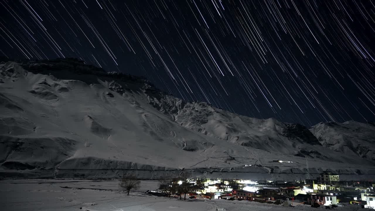 Star-trial night sky time-lapse of the monk town kaza in the heart of ...