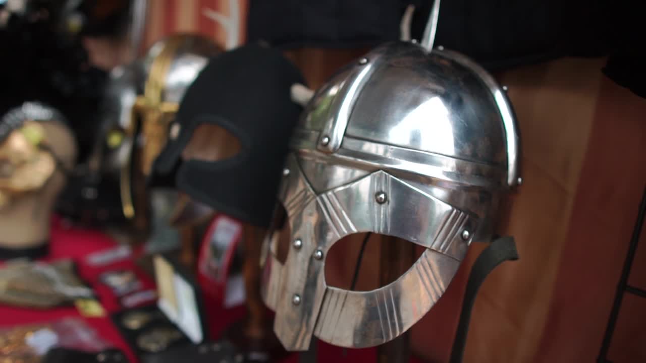 Premium stock video - A beautiful metal medieval helmet on display