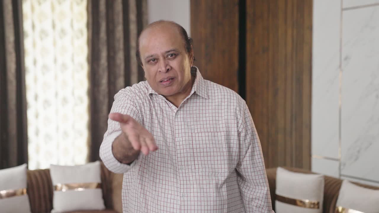 Angry Indian old man arguing with somebody | Premium Stock Video Footage